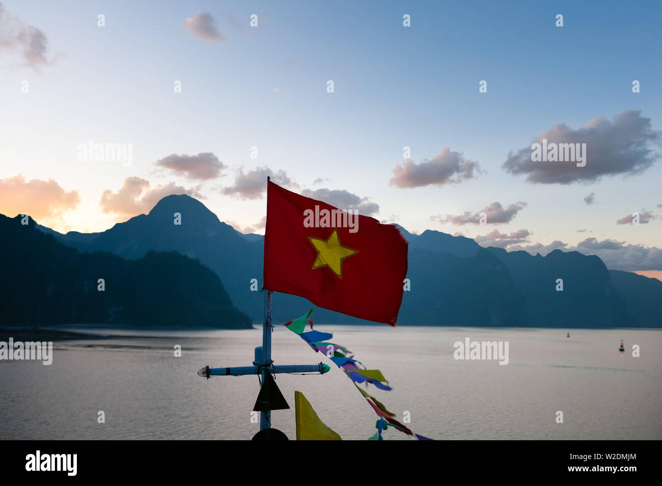 Halong bay and flag of Vietnam Stock Photo - Alamy