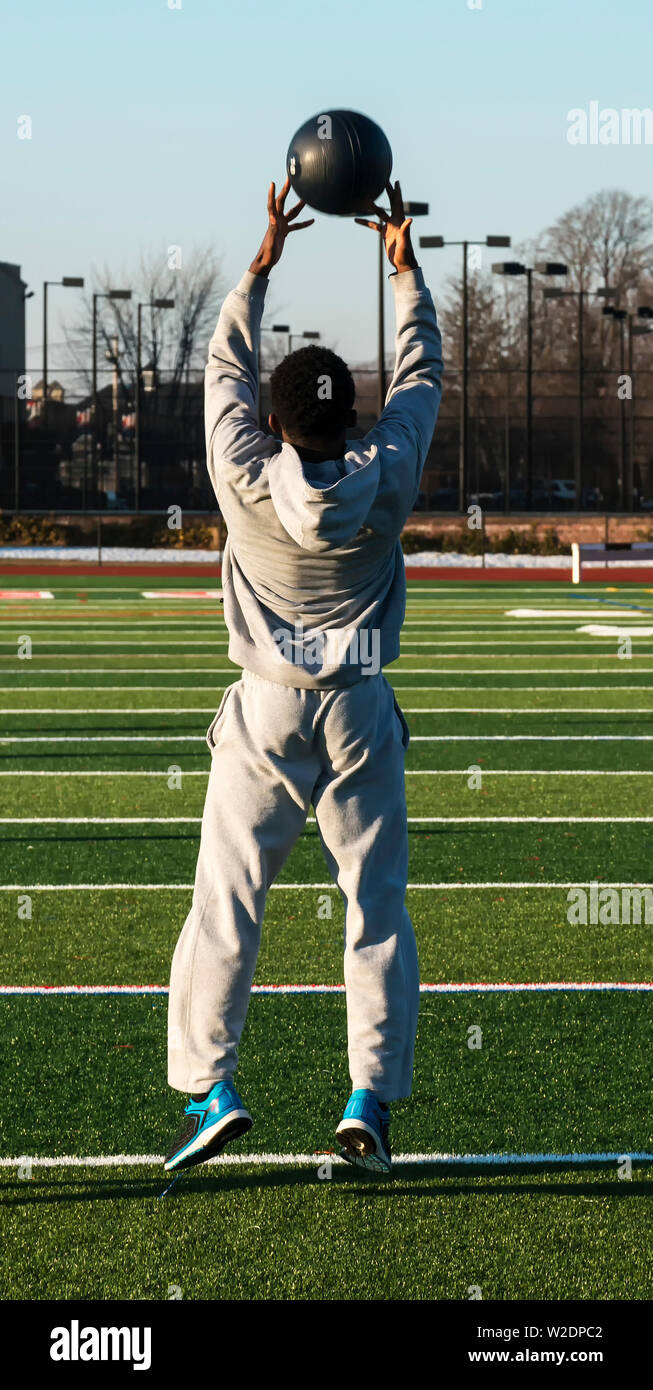 Children throwing a ball school hi-res stock photography and images - Alamy