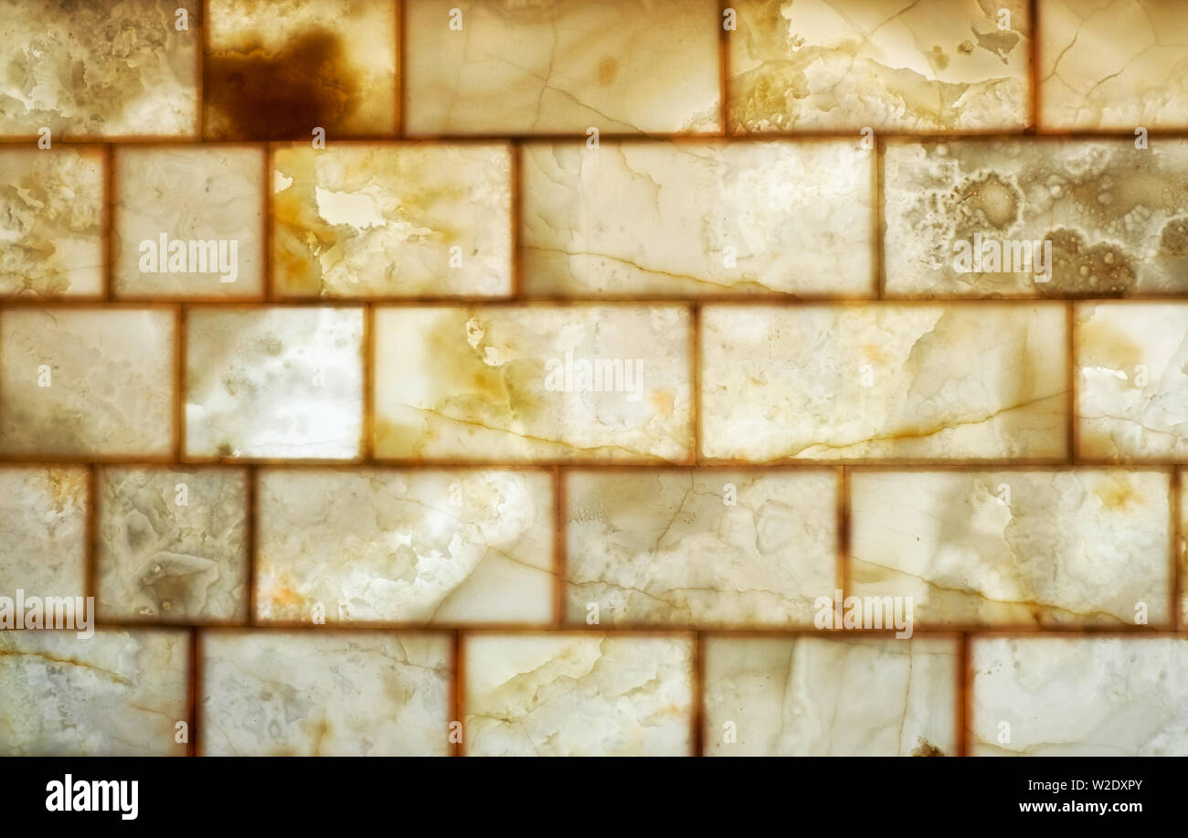 Onyx brick wall background. Texture of honey color onyx material Stock ...