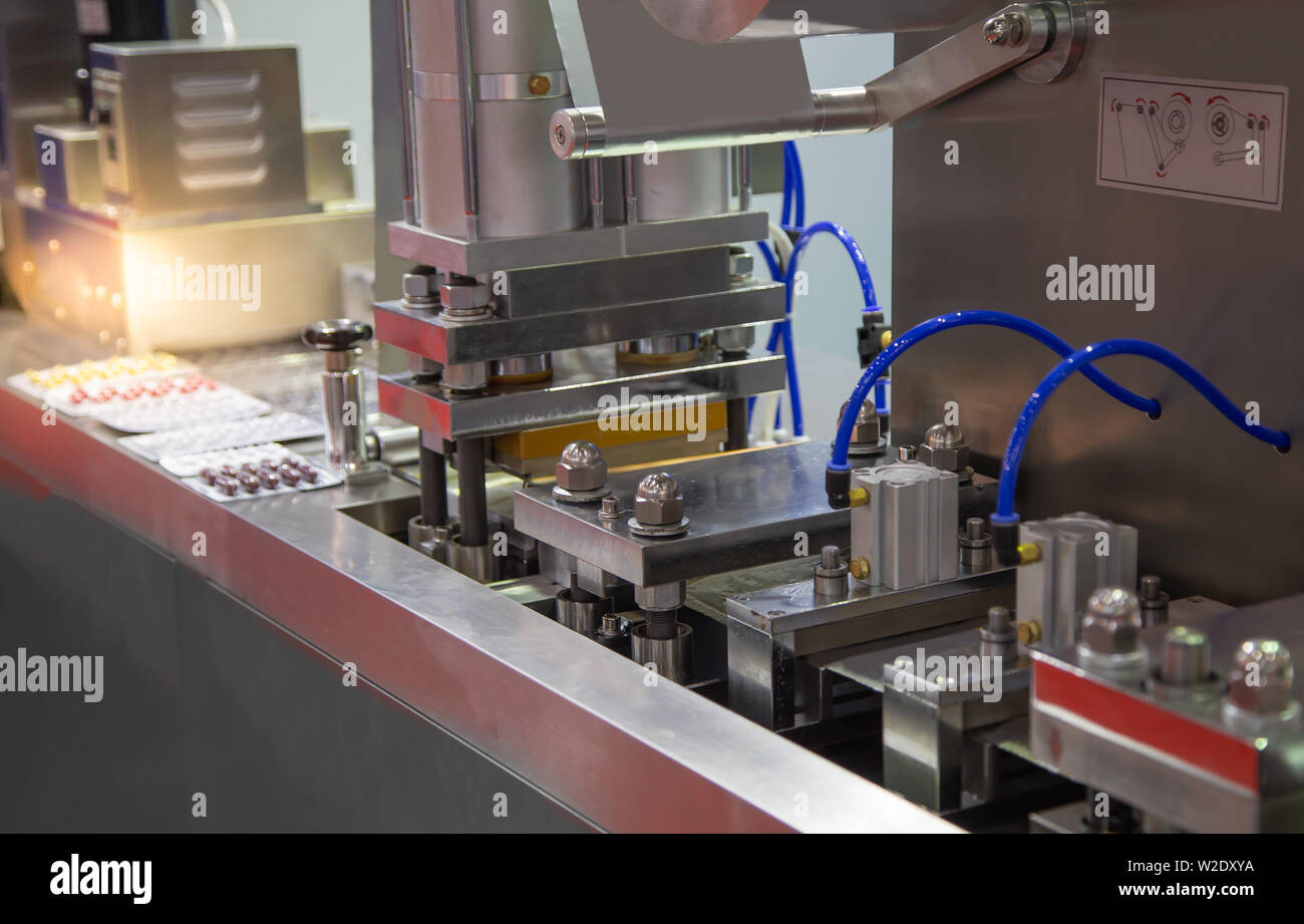 Capsule blister packing machine in pharmaceutical industrial Stock ...