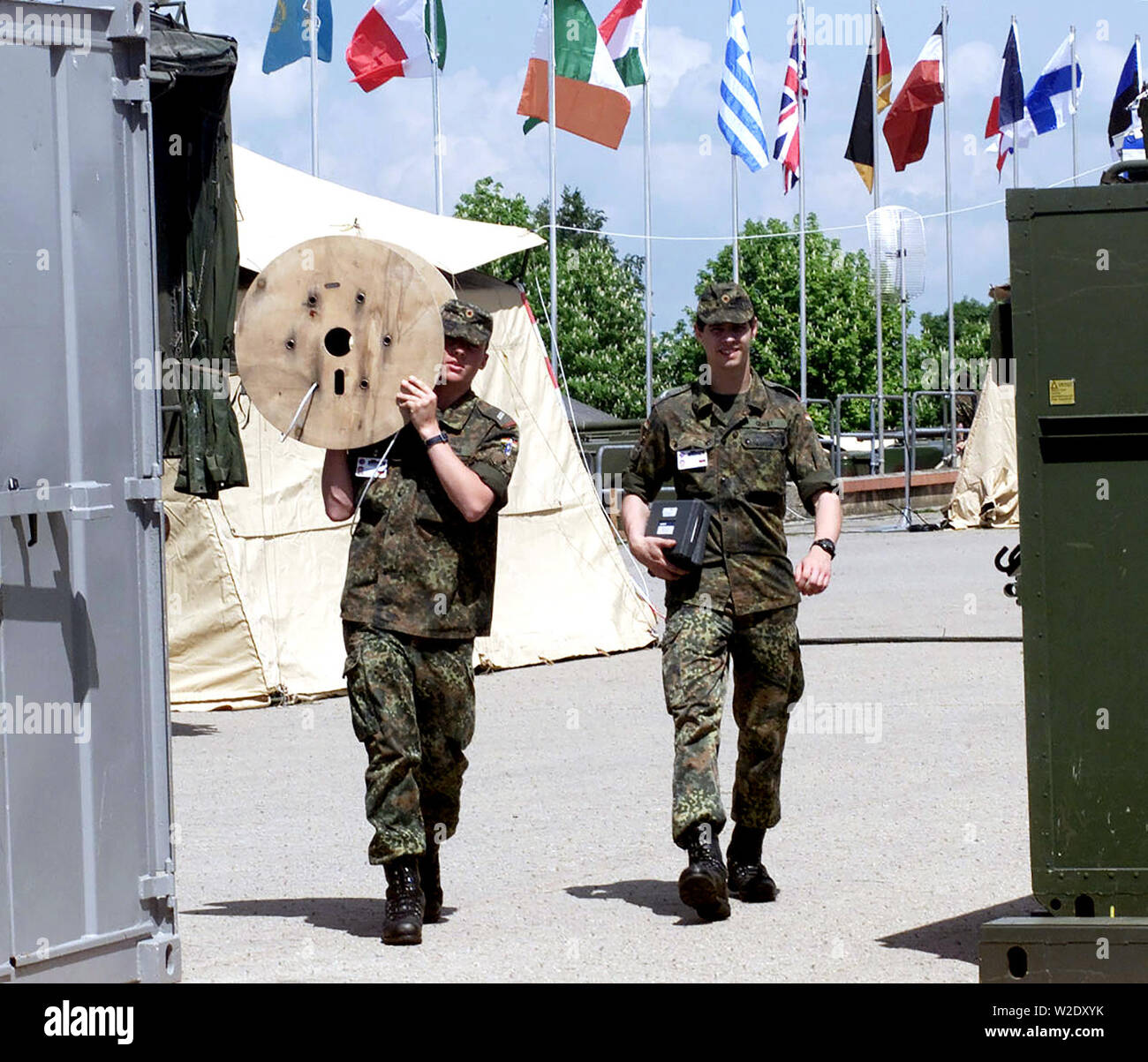 Two German Army Soldiers assigned to the Artillery Detachment prepare ...