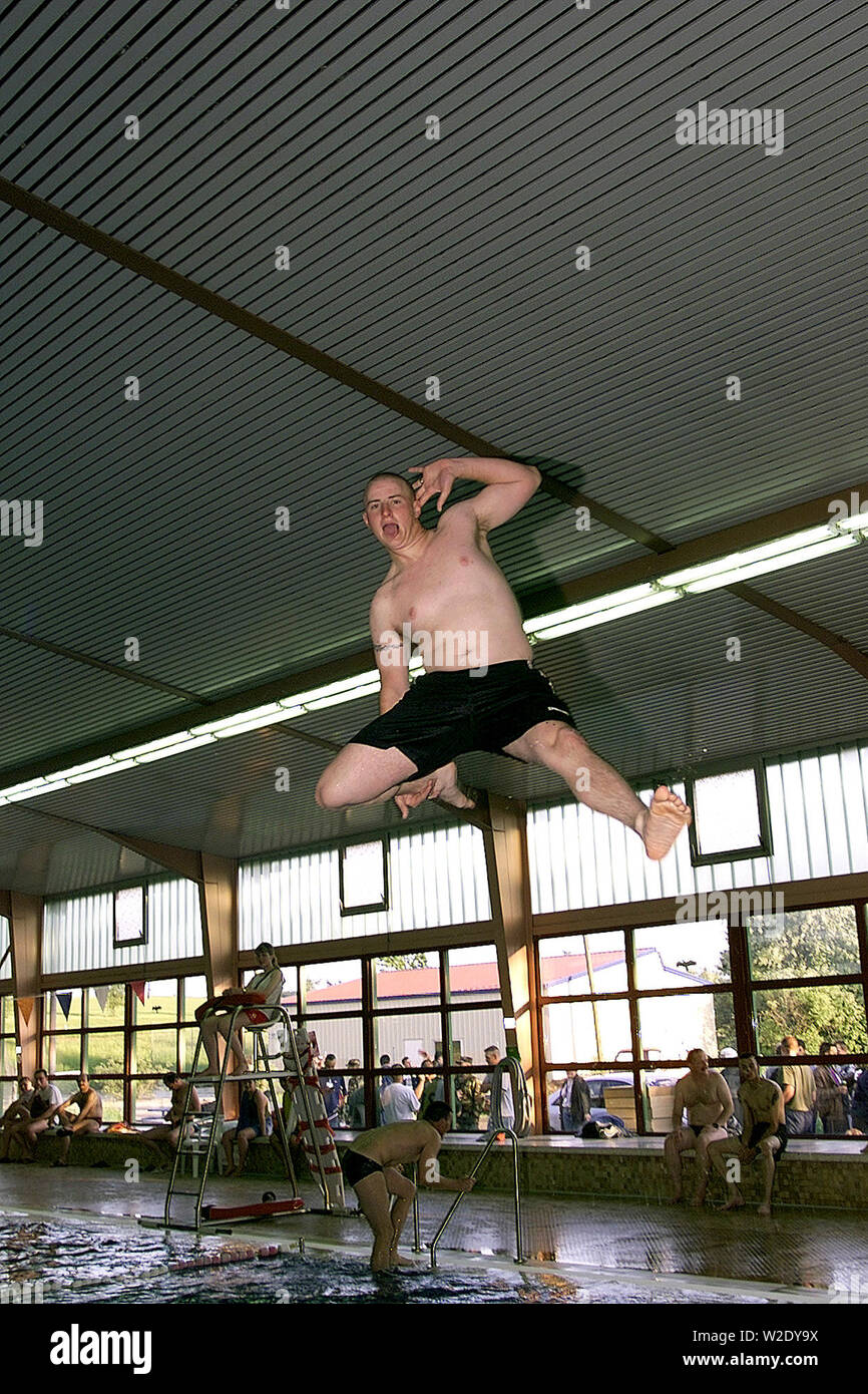 Indoor swimming pool with diving board hi-res stock photography and ...