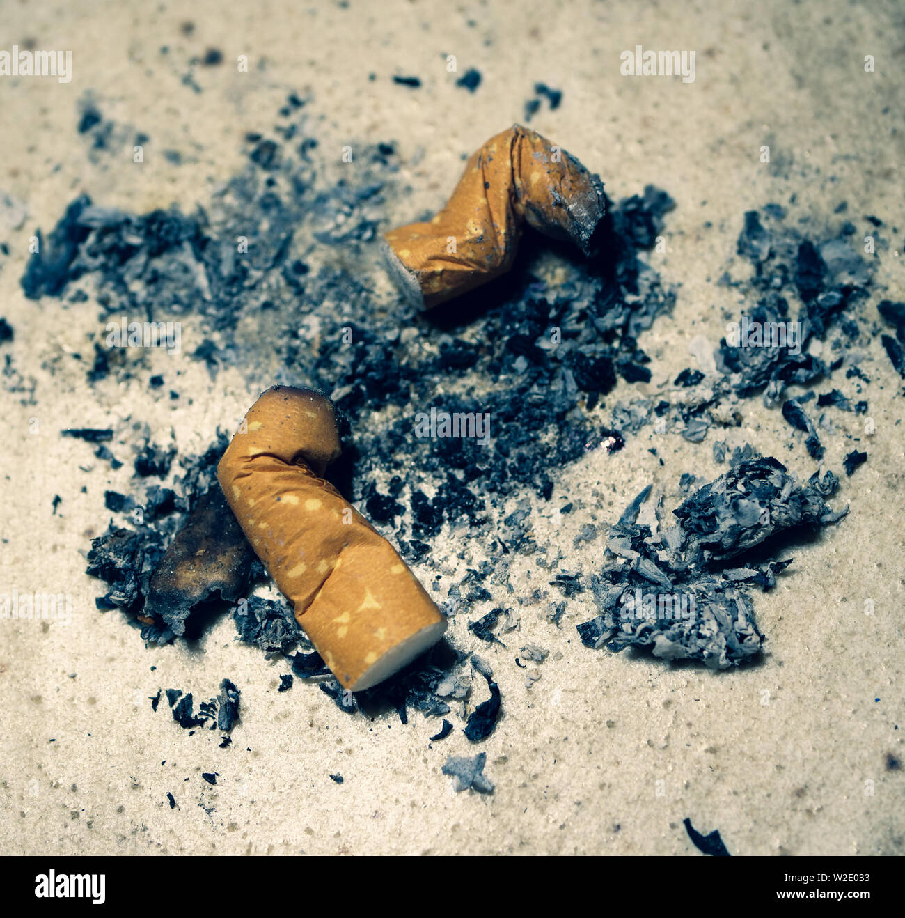 Close up of burning cigarettes with smoke and fumes Stock Photo - Alamy