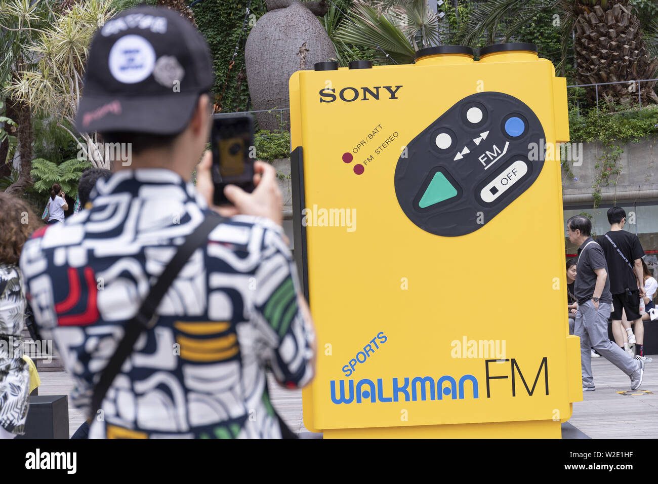 Tokyo, Japan. 8th July, 2019. A man takes a picture of a huge portable ...