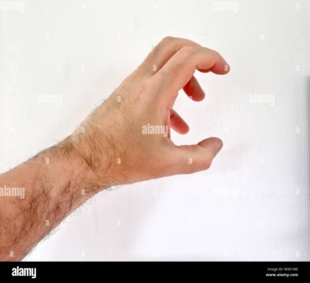 Male human hand showing different gestures and symbols Stock Photo - Alamy