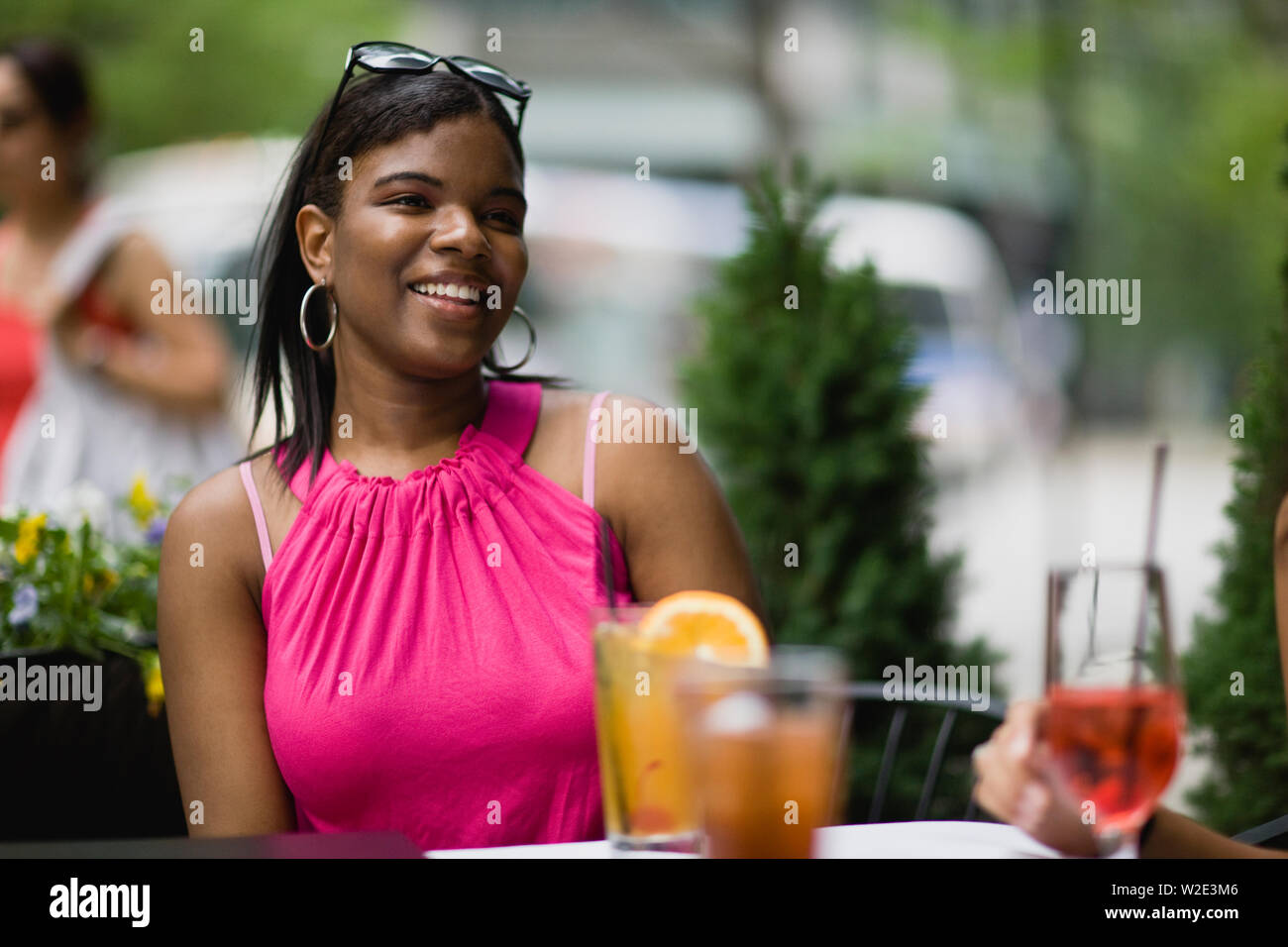 Woman seated in cafe hi-res stock photography and images - Alamy