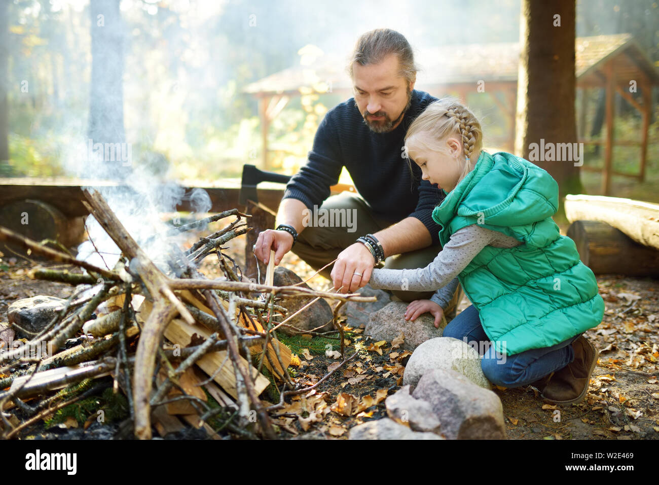 Teaching kids how to start a fire hi-res stock photography and images ...