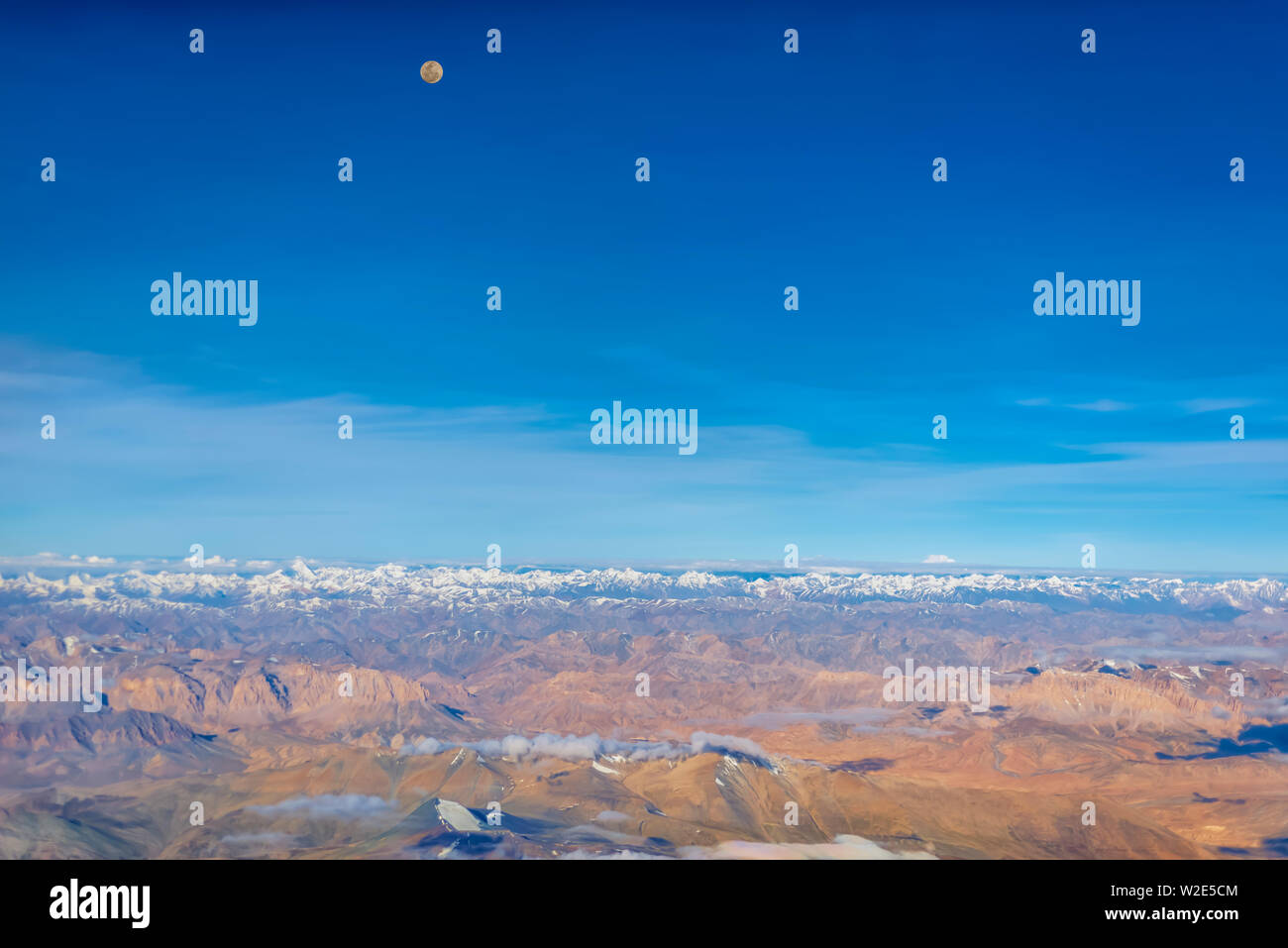 Full moon over the barren mountains of the Zanskar range of inner ...
