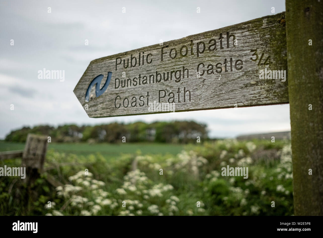 Coast path direction signs at Embleton, Northumberland, UK Stock Photo ...