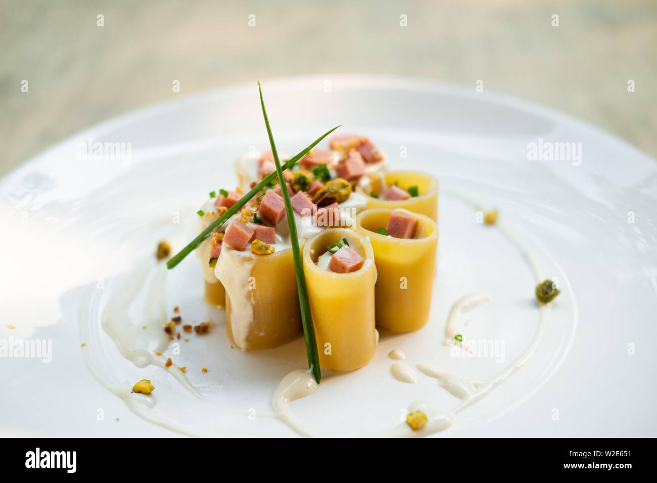 Paccheri Italian fresh traditional pasta with mortadella bologna ham ...