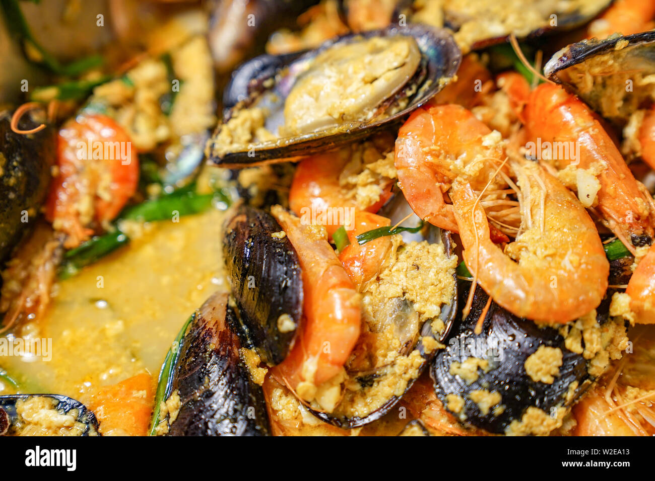Curry shrimp and Mussel in the international line buffet Stock Photo ...