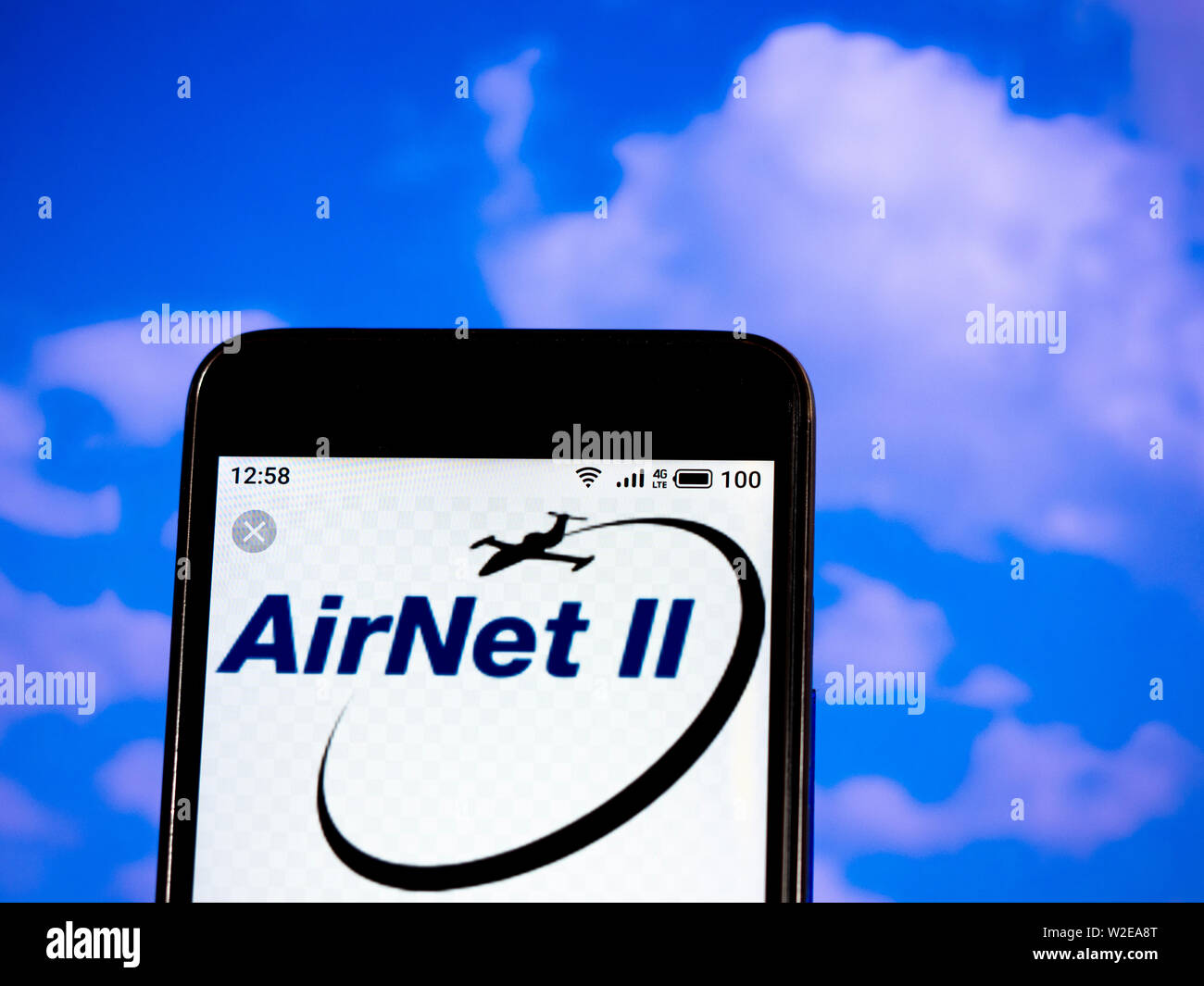 In this photo illustration the AirNet II, LLC. logo is seen displayed ...
