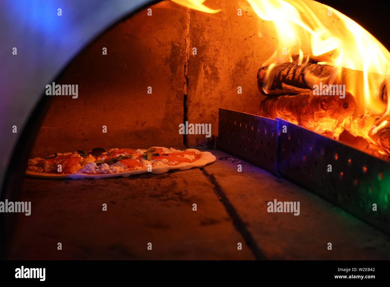 Vintage old Oven with fire inside for baking Original Pizza Stock Photo ...