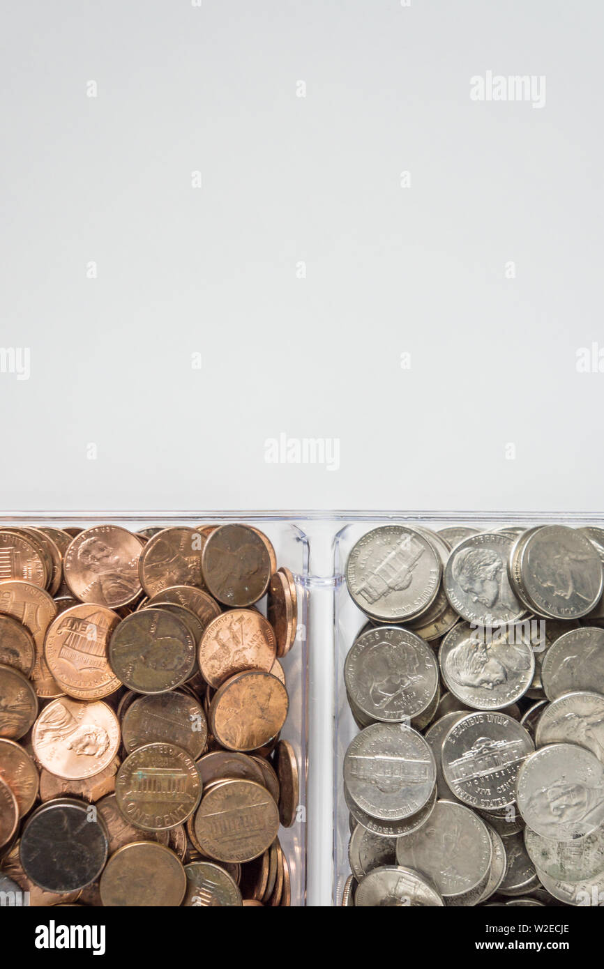 Isolated organized loose coin change on bottom side, white background ...