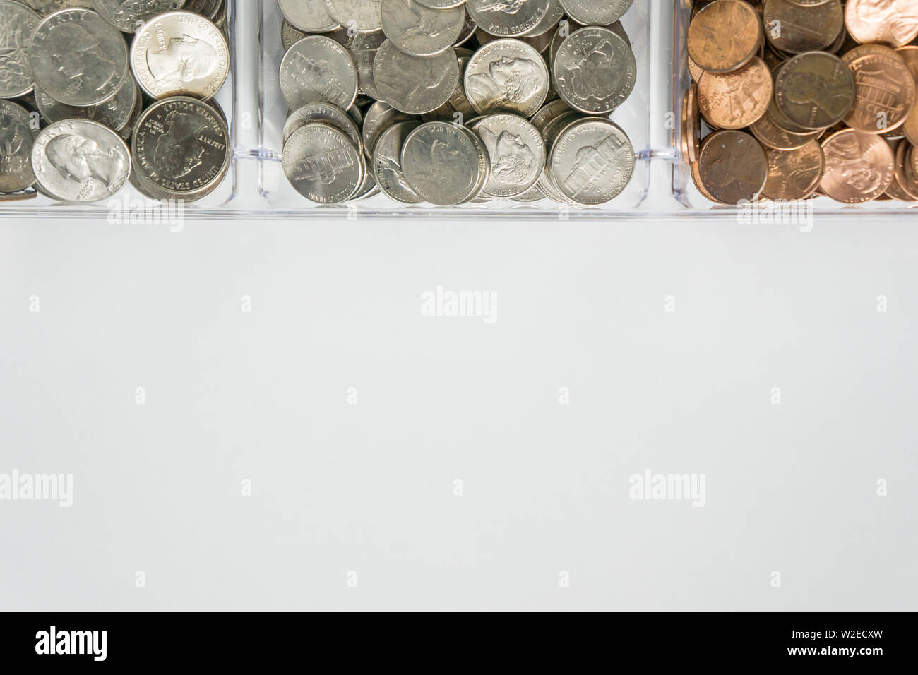 Isolated organized loose coin change on top side, white background ...