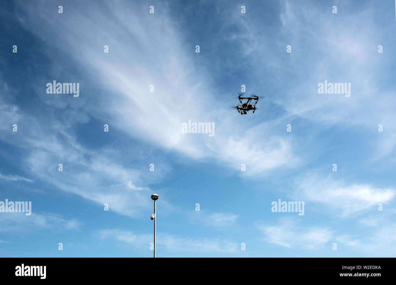 Drone in flight Stock Photo - Alamy