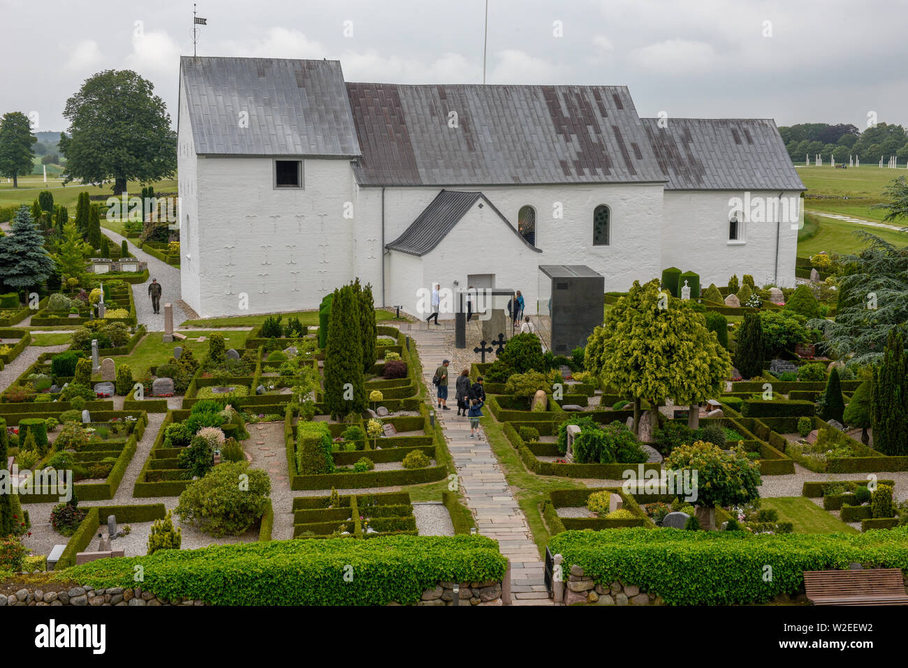 Jelling, Denmark - 20 June 2019: people visiting the church of Jelling ...