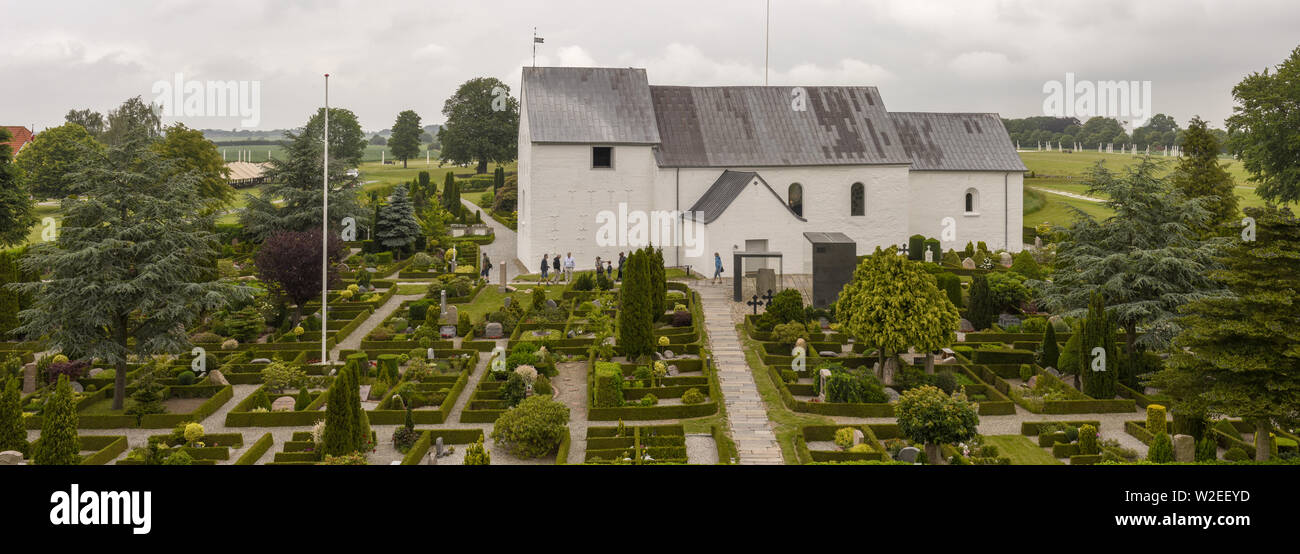 Jelling, Denmark - 20 June 2019: people visiting the church of Jelling ...