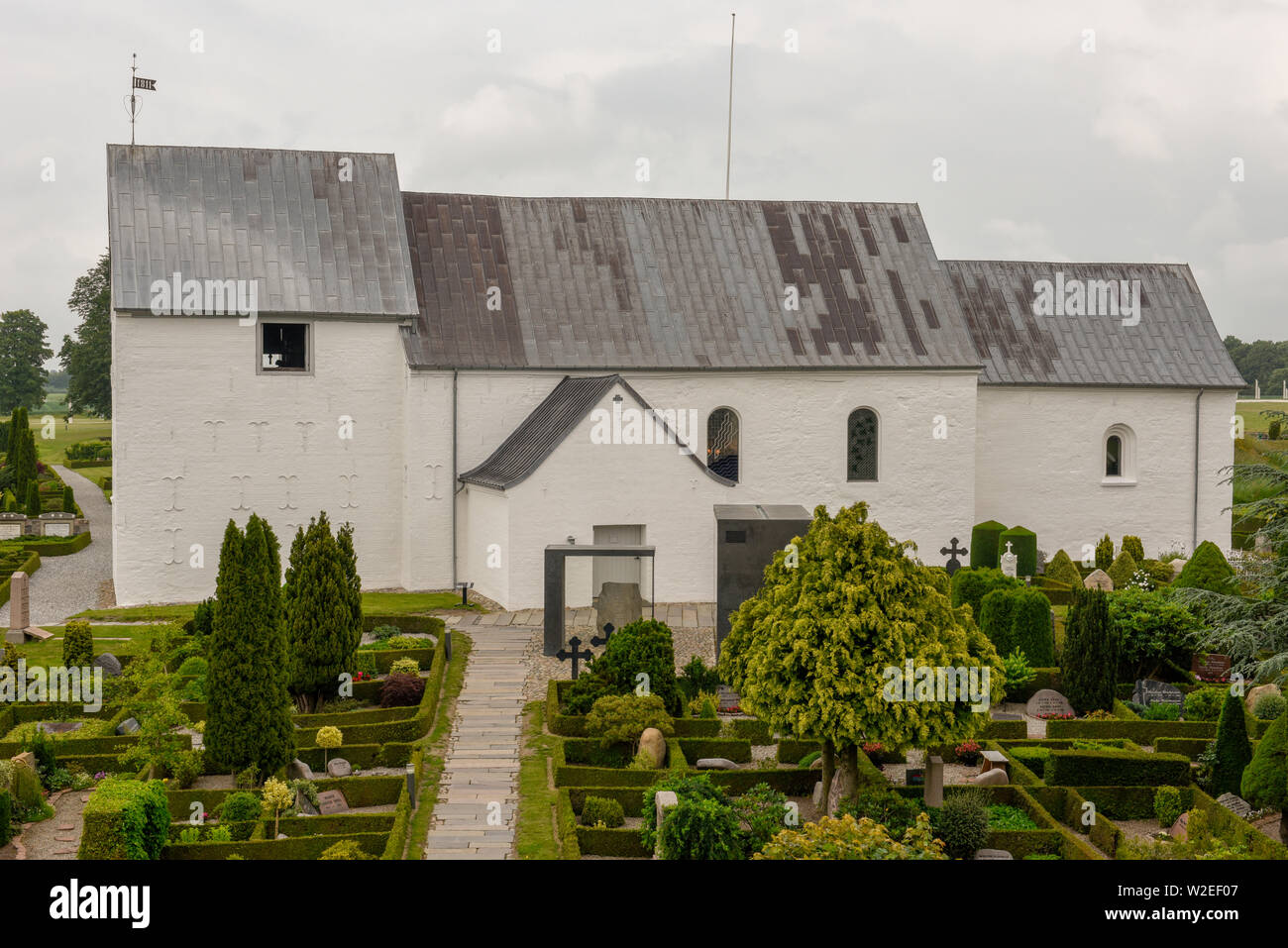 Jelling, Denmark - 20 June 2019: people visiting the church of Jelling ...