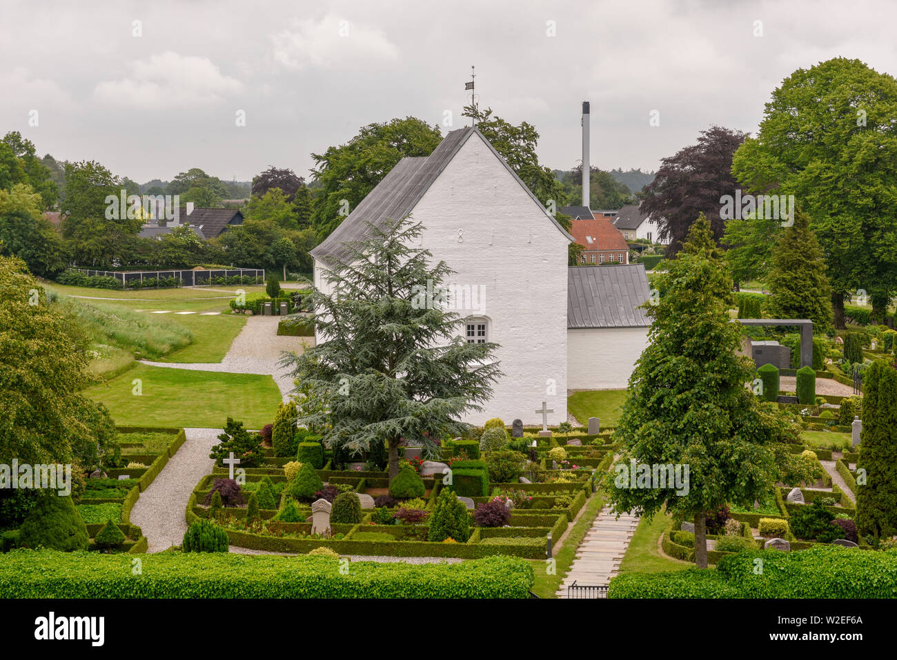 Jelling, Denmark - 20 June 2019: people visiting the church of Jelling ...