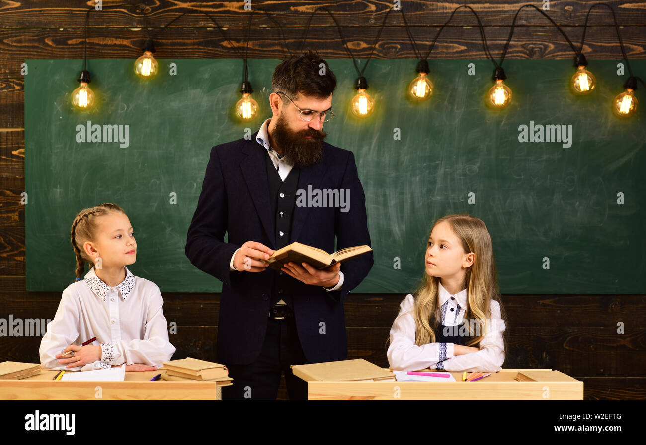 school lesson. school lesson of two small girls. little girls and ...