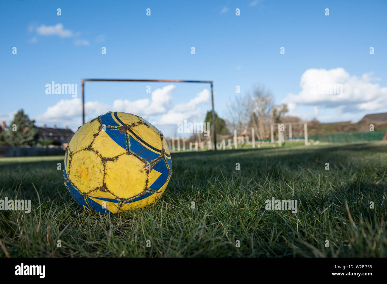 Old playground with rusty goal posts Stock Photo - Alamy