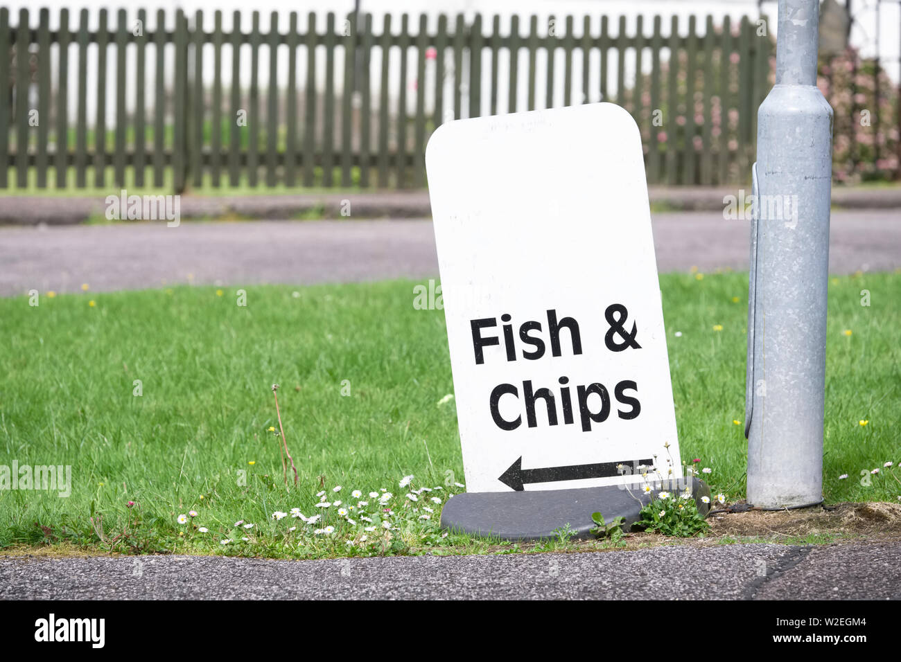 Fish and chips shop cafe takeaway sign uk Stock Photo - Alamy