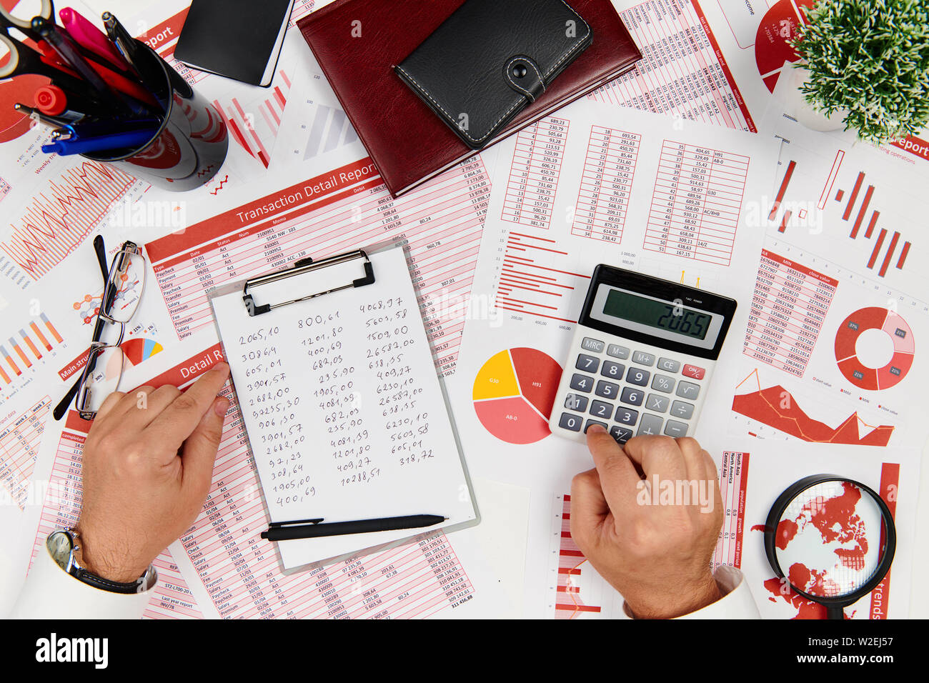 Business reports, data tables and charts - directly above view of ...