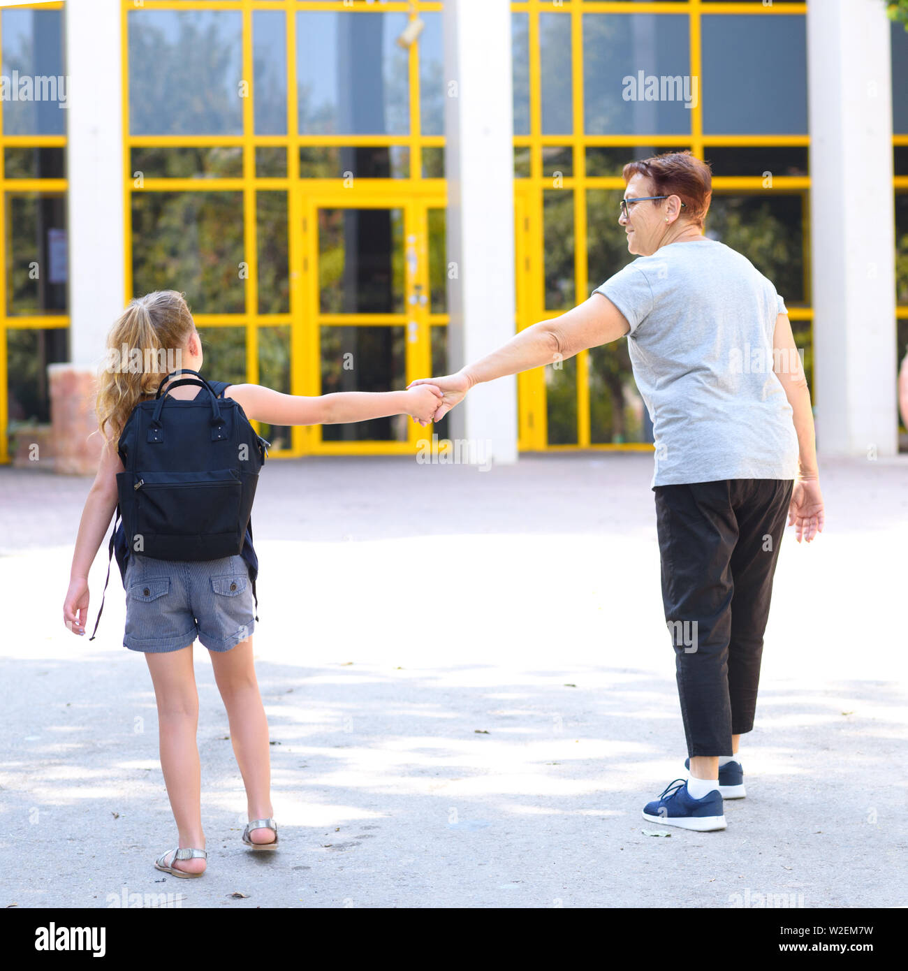 Two children dragging hi-res stock photography and images - Alamy