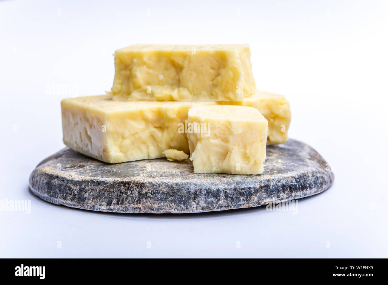 Cheddar cheese collection, block of Cheddar cheese made from cow milk ...