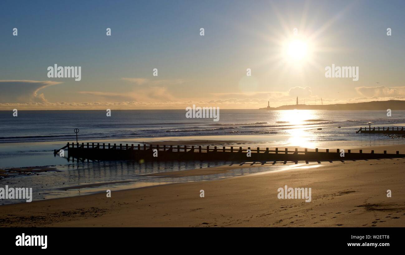 Sunny Winters Morning over Aberdeen Beach, with Girdle Ness Lighthouse ...