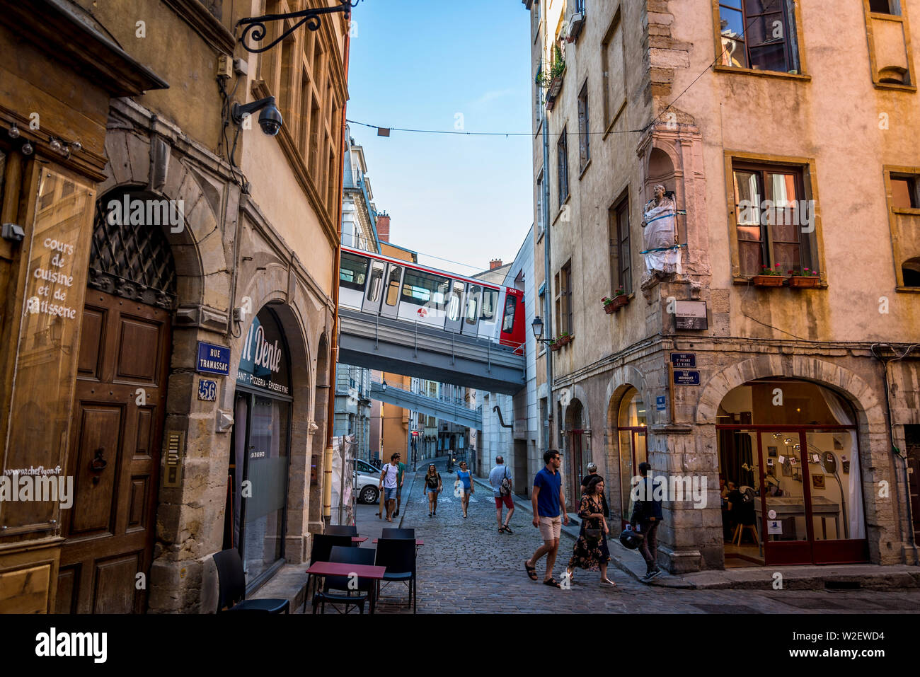 Metro line going over a street in in Vieux Lyon or Old Lyon, one of ...