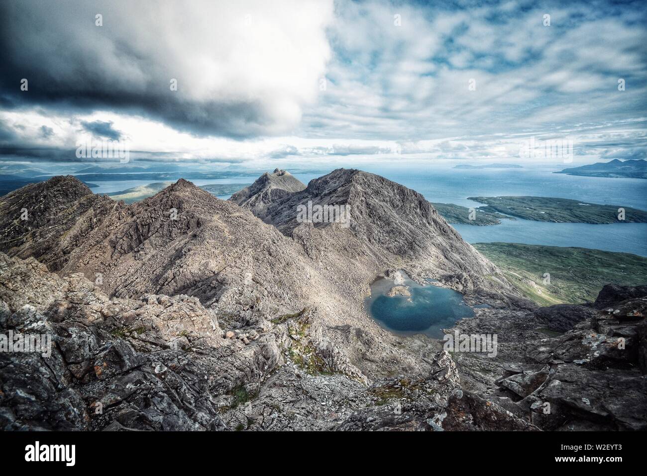 Beautiful rocky field with breathtaking sky Stock Photo - Alamy