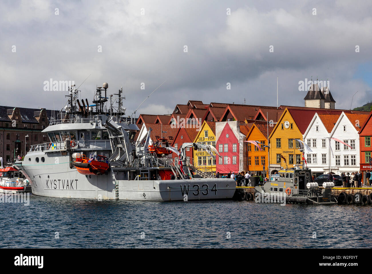 Coast Guard vessel W334 KV Tor moored at the Hanseatic Bryggen quay, in ...