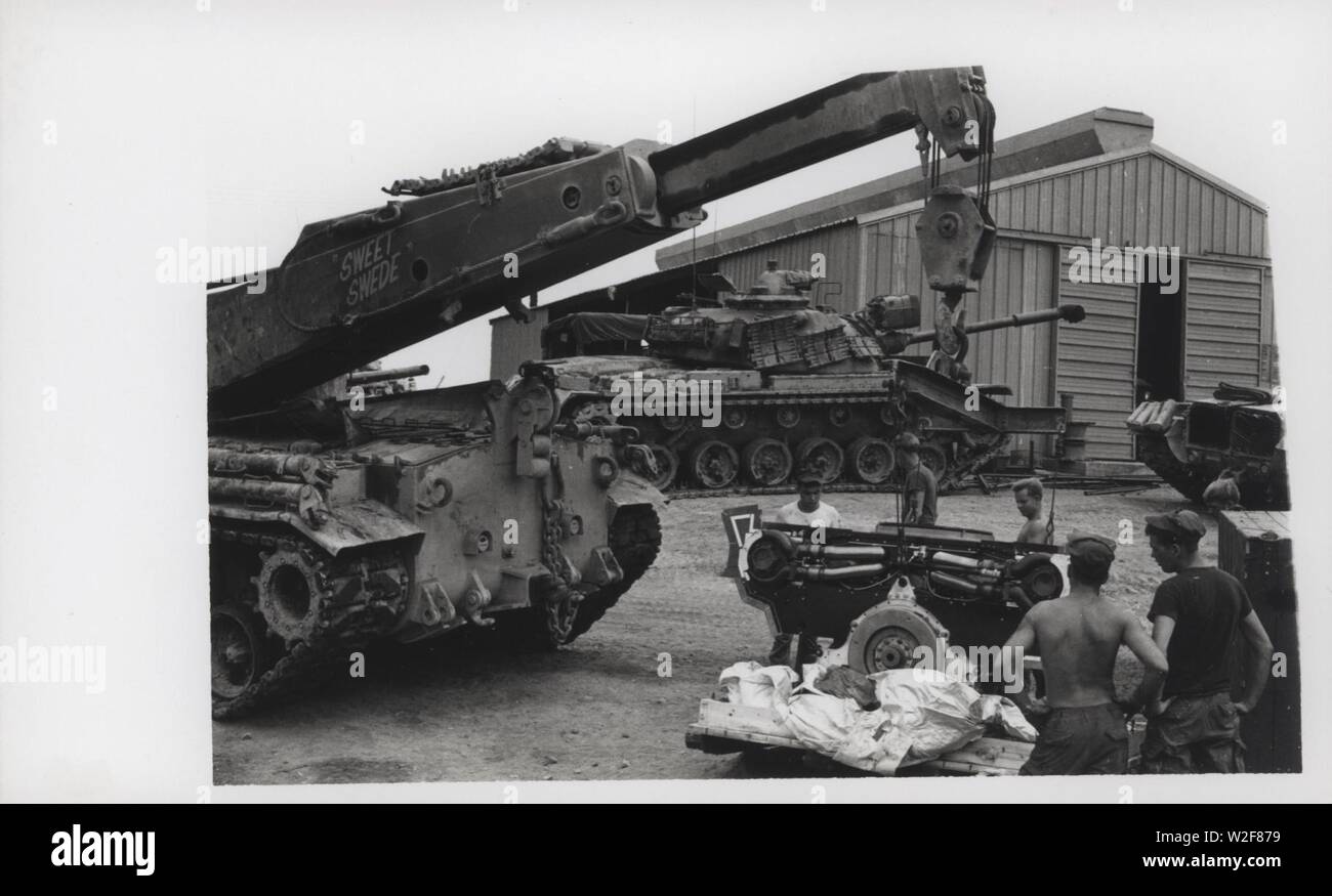 Changing the engine on a 3rd Tank Battalion tank at Dong Ha Combat Base ...