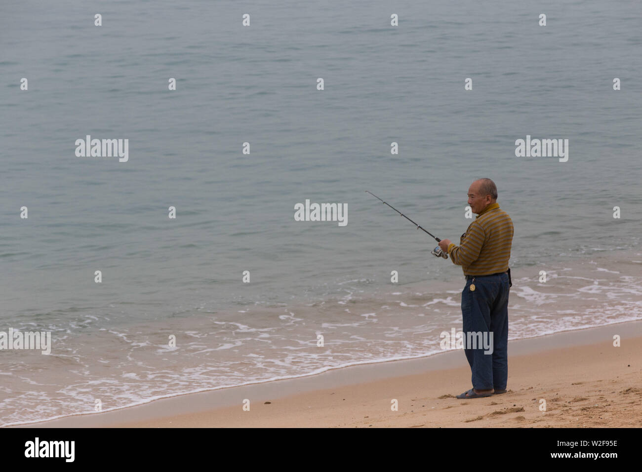 Old man fishing hi-res stock photography and images - Alamy