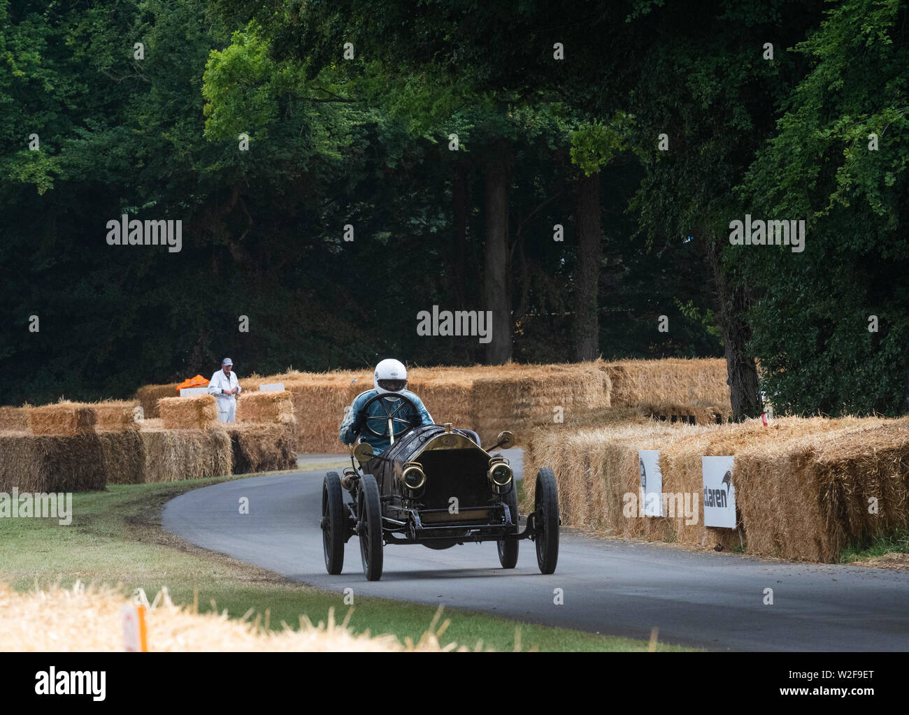 Vintage car racing up the hill climb at the Goodwood Festival of Speed ...