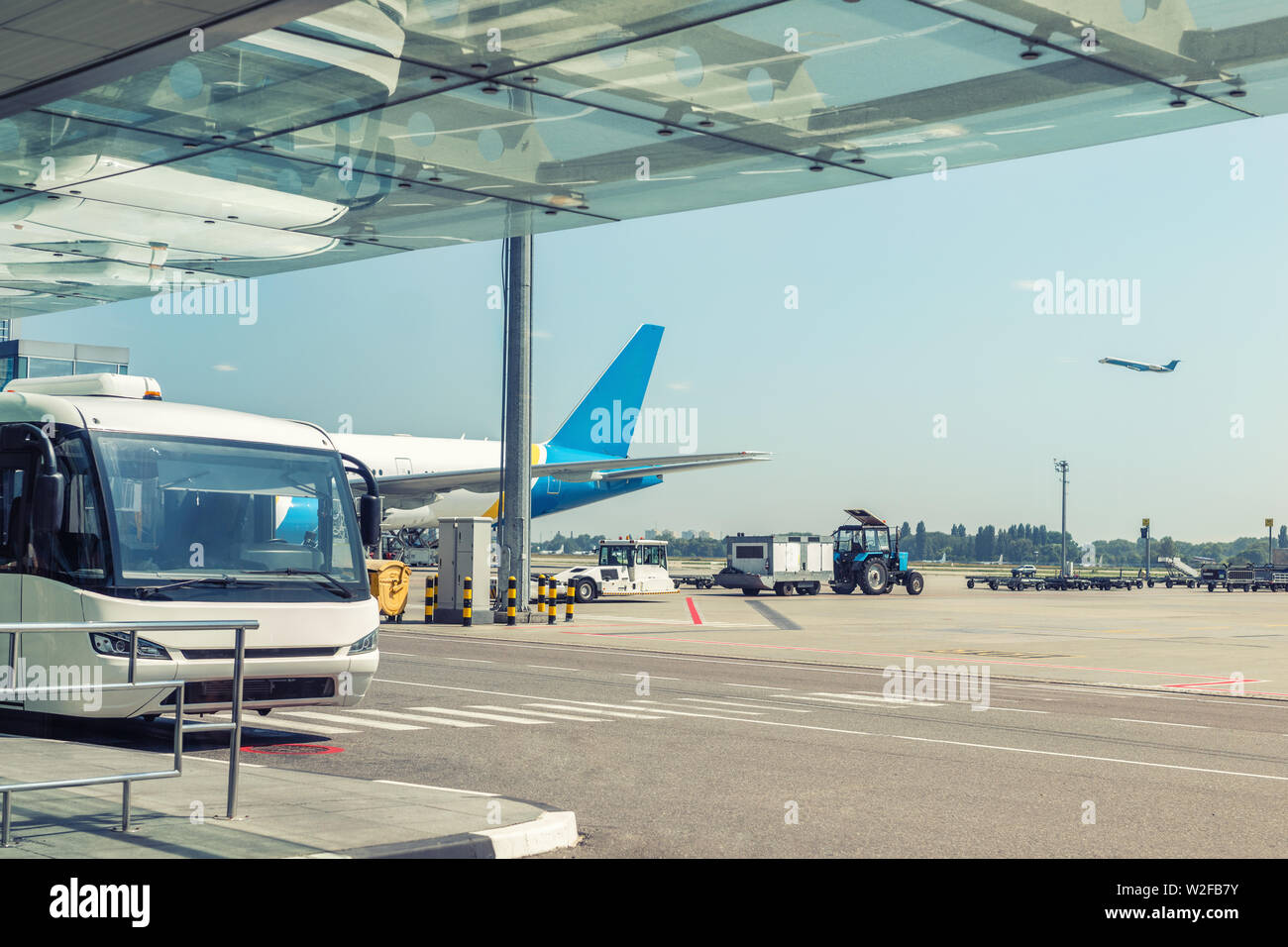 Airport environment and services. Shuttle bus waiting for passengers at ...