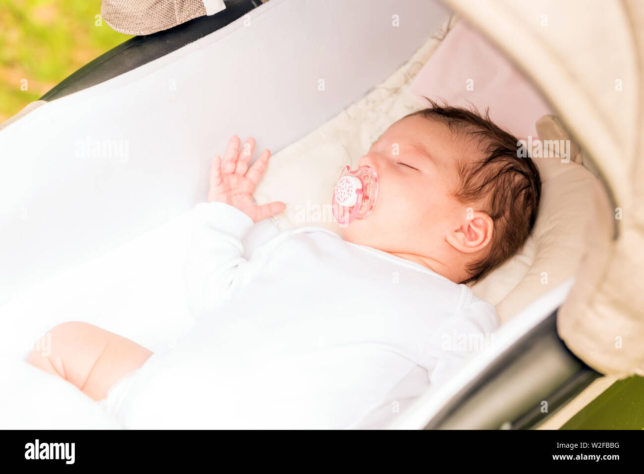 Toddler sleeping in stroller hi-res stock photography and images - Alamy