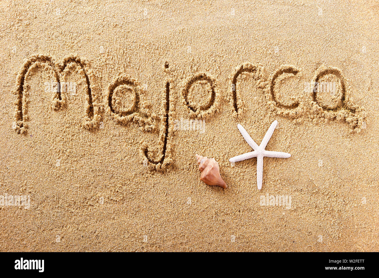 Majorca Mallorca hand written beach word travel concept Stock Photo - Alamy
