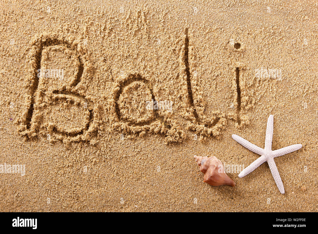Bali hand written beach word travel concept Stock Photo - Alamy