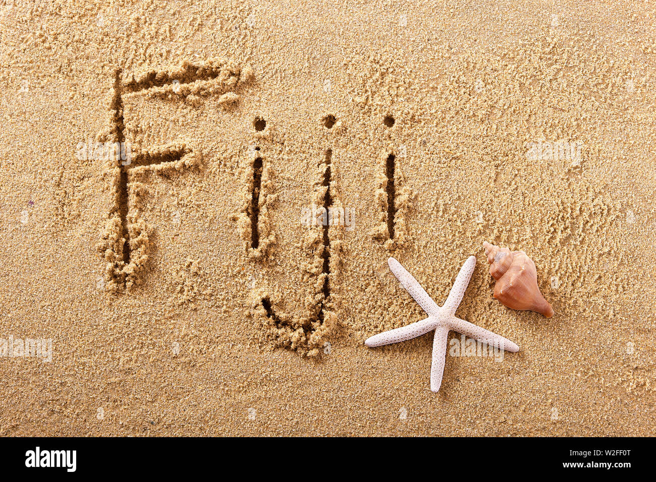 Fiji hand written beach word travel concept Stock Photo - Alamy