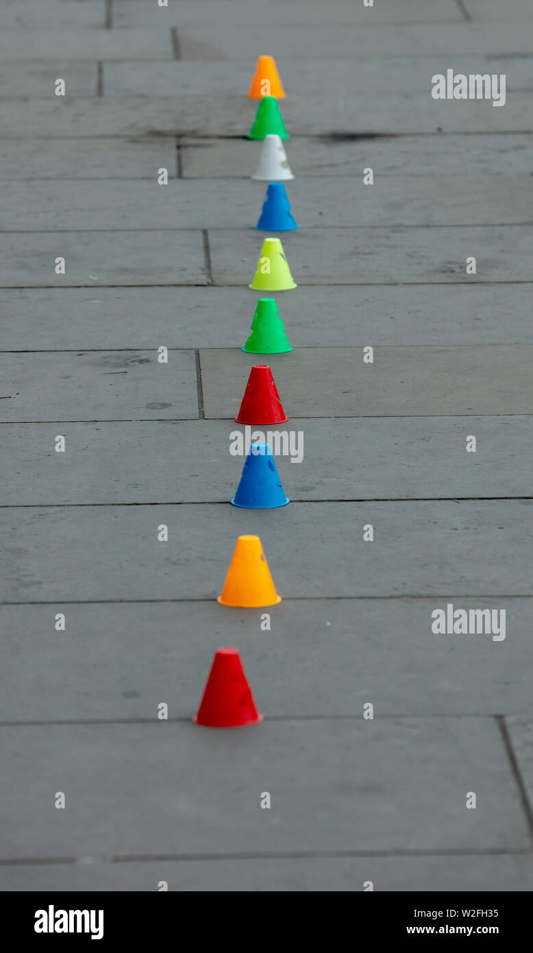 Colourful cones seen on paving Stock Photo - Alamy