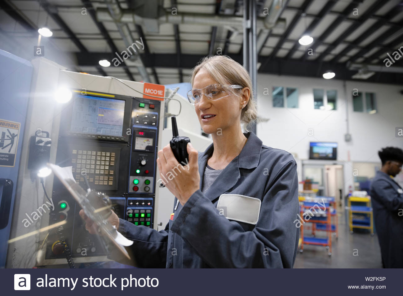 Woman operating computer hi-res stock photography and images - Alamy