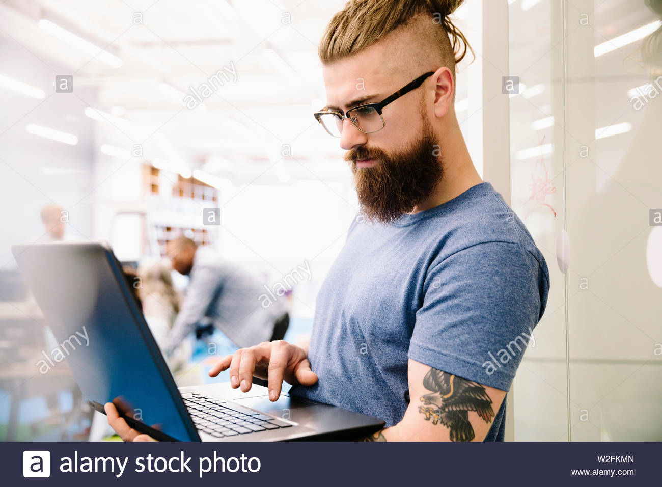 Tattoos in office hi-res stock photography and images - Alamy