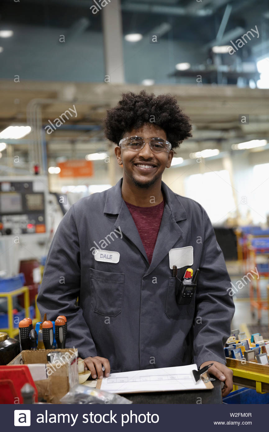 Happy men in factory hi-res stock photography and images - Alamy