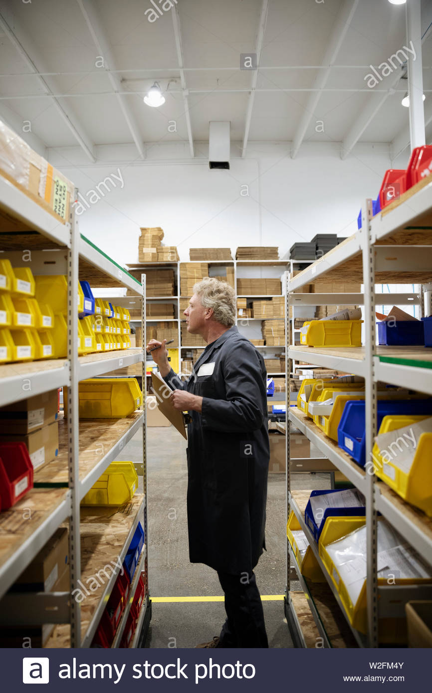 Worker checking inventory hi-res stock photography and images - Alamy