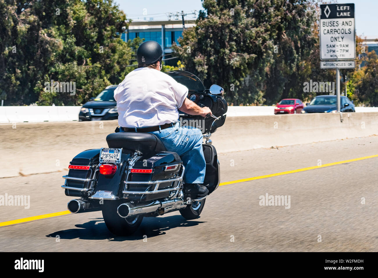 Man riding harley davidson motorcycle hi-res stock photography and ...