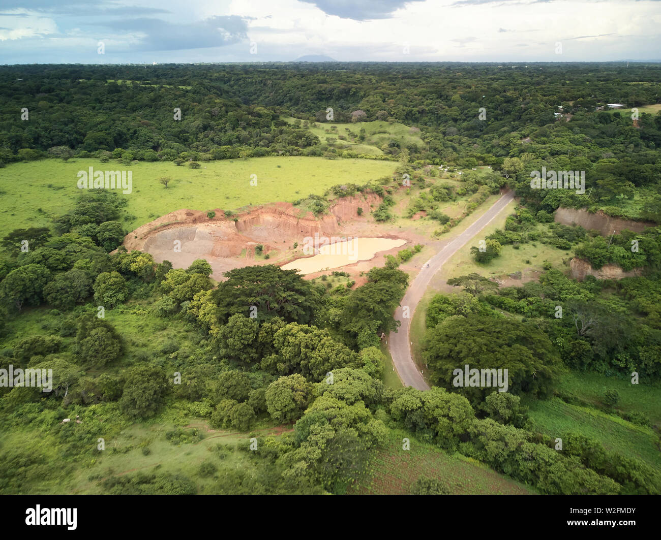 Big trench next to road aerial above top drone view Stock Photo - Alamy
