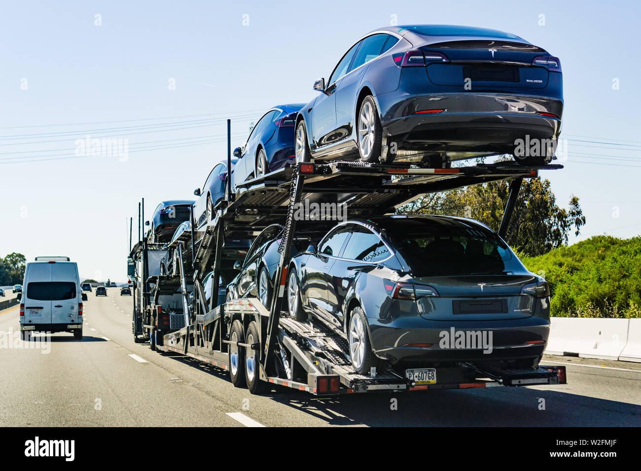 July 4, 2019 Redwood City / CA / USA - Car transporter carries Tesla ...